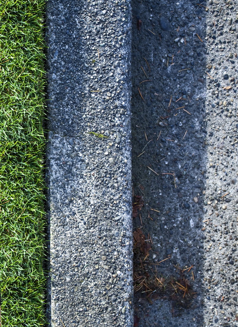 Wheel Stops and Curbs - SouthCo Sweeping & Maintenance - Commercial ...